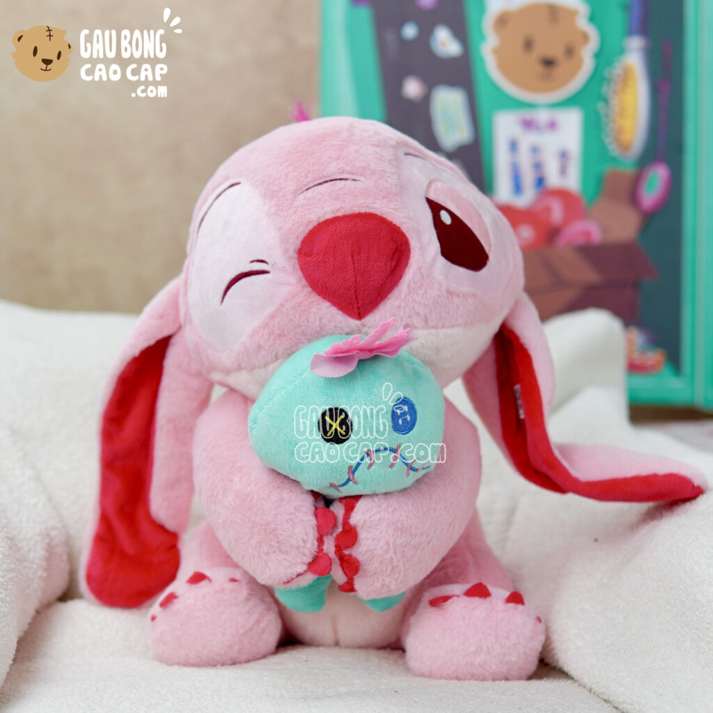 Gấu Bông Stitch Hồng ôm búp bê - Shop Gấu Bông Stitch - gaubongcaocap.com