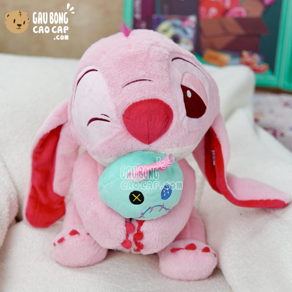 Gấu Bông Stitch Hồng ôm búp bê - Shop Gấu Bông Stitch - gaubongcaocap.com